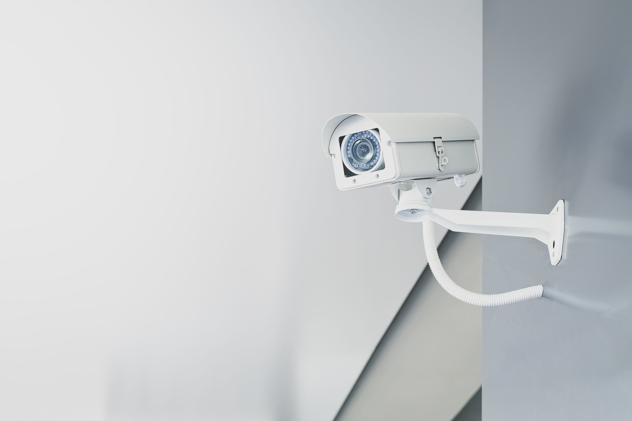 CCTV security camera on wall in the home office for surveillance ...